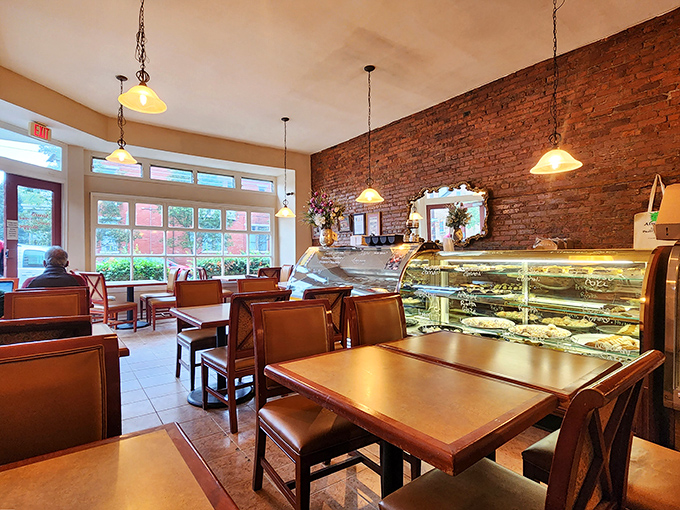 The dining room feels like that Italian café you discovered on vacation. Sunlight streams through large windows, illuminating a space where carbs and conversation flow freely.
