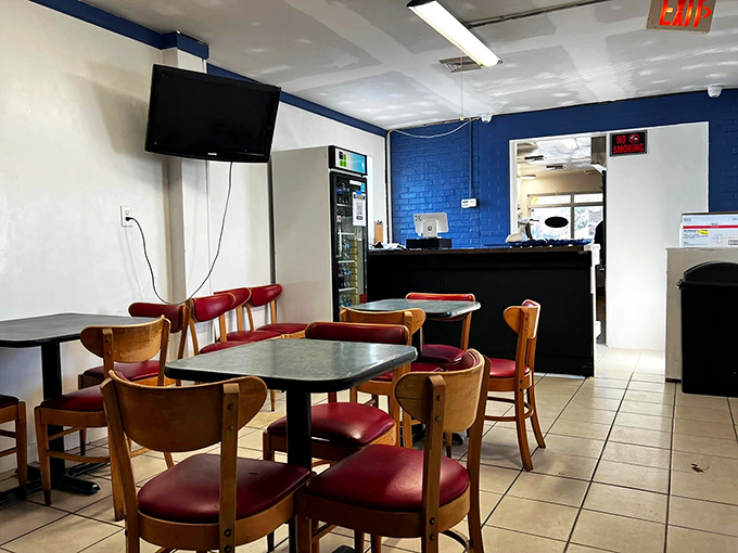 Red chairs invite you to sit and contemplate the deeper meaning of comfort food in a space that prioritizes substance over style.