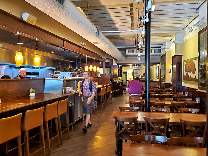 The dining room feels like the living room of that friend who always throws the best dinner parties—inviting, stylish, and ready for good times.