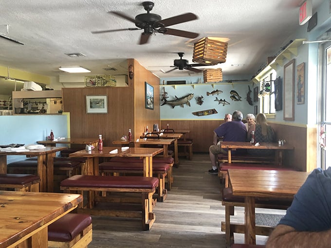 The dining area's wood-paneled simplicity lets you focus on what matters: the seafood that will shortly be making you contemplate moving to Crystal River permanently.