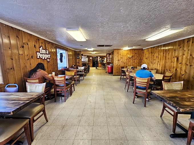 No designer lighting or trendy decor here—just honest wood paneling and tables where memories are made. 