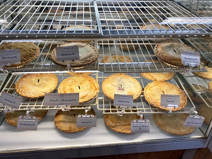 The pie case – where life-altering decisions are made daily and "I'll just have a small piece" becomes the biggest fib in Ohio.