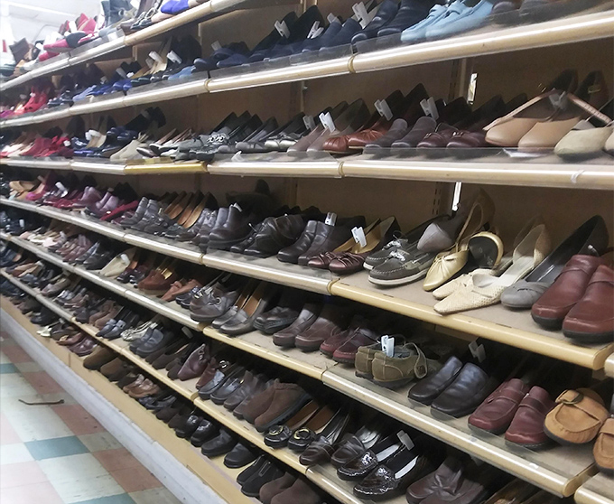 The shoe section: a leather landscape of possibilities. Some barely worn, others with character—all waiting for the right feet to come along.