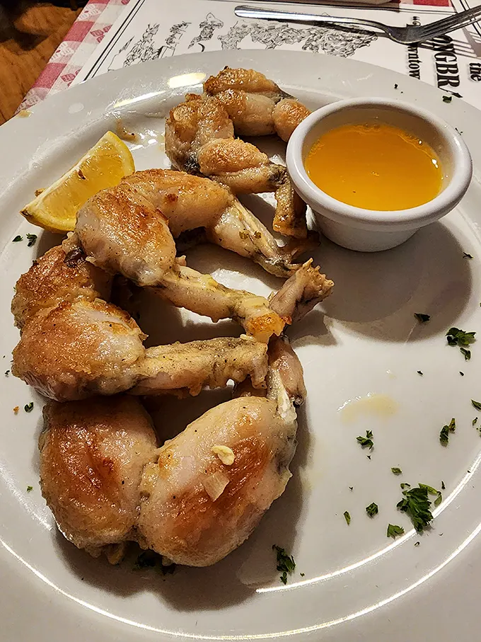 These frog legs aren't just a culinary adventure—they're a conversation starter served with a side of butter sauce and local bragging rights.