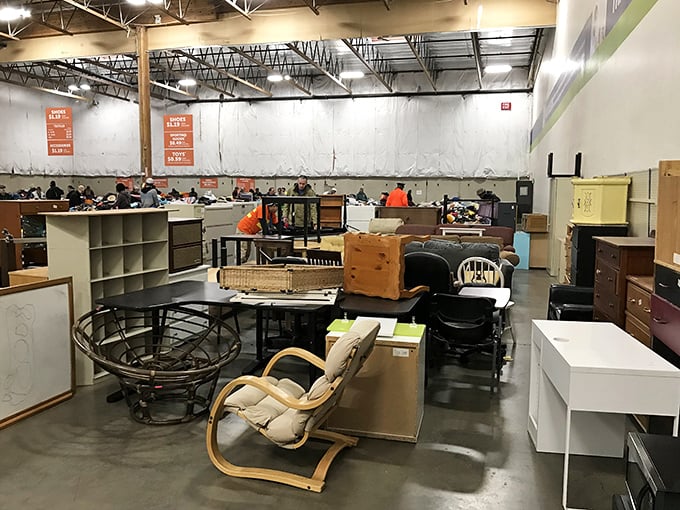 The furniture section: where mid-century modern pieces hide among office castoffs, waiting for someone with vision to rescue them. 
