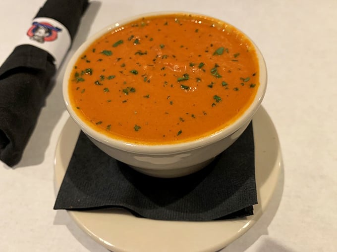 Gouda cheese soup that's basically a warm hug in a bowl. The vibrant color promises—and delivers—comfort that transcends mere sustenance.