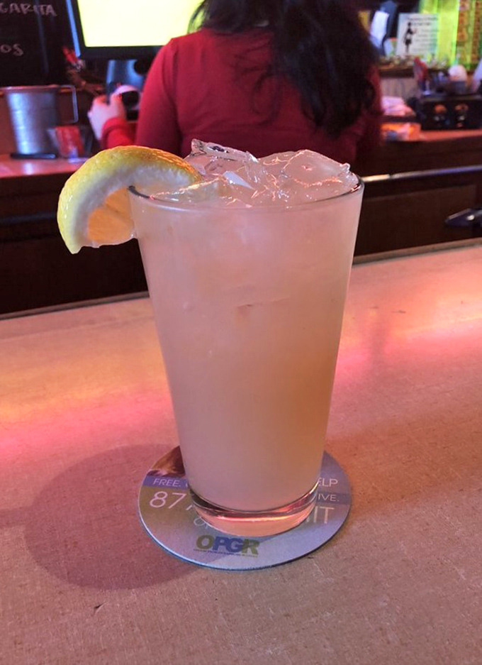 A refreshing grapefruit lemonade with a wedge of citrus – the perfect counterpoint to a hearty breakfast or the start of happy hour.