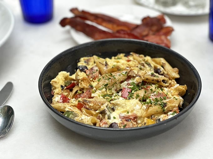 This isn't just scrambled eggs—it's a skillet symphony. Fresh avocado and pico de gallo elevate this breakfast classic to headline status.