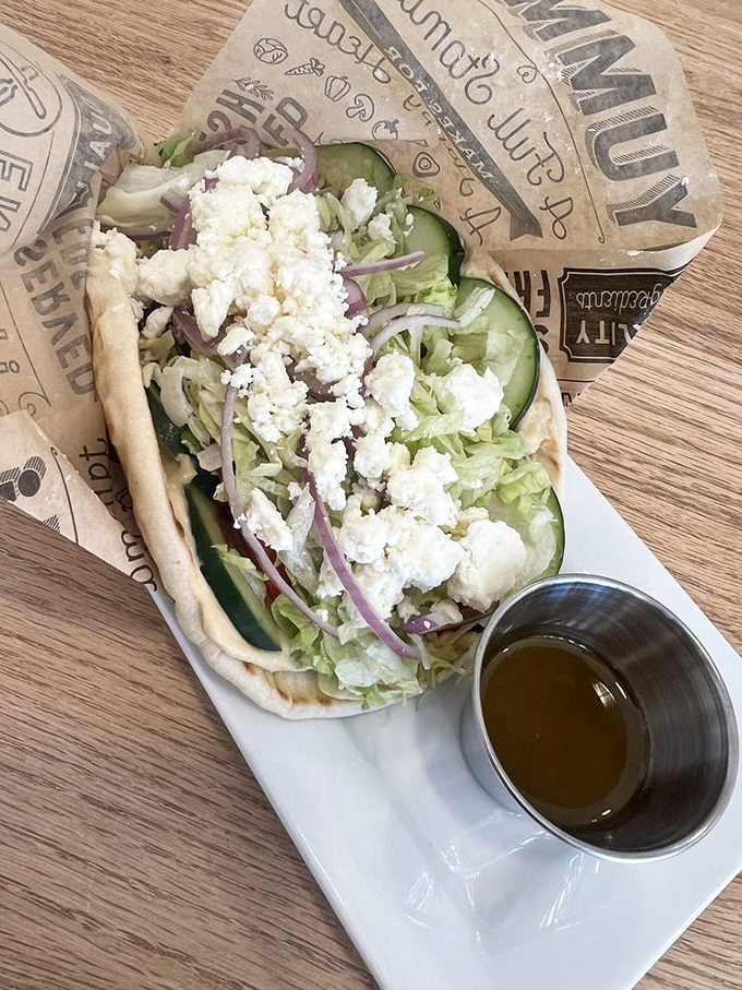 This isn't just a Greek gyro—it's a Mediterranean vacation wrapped in pita, with feta playing the starring role.