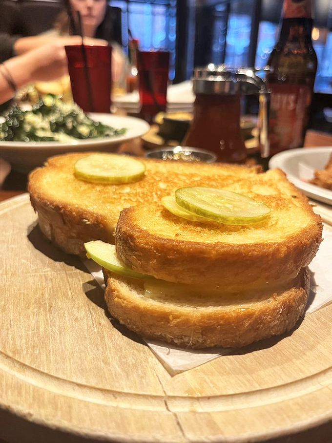 Grilled cheese elevated from lunchbox staple to culinary masterpiece. Those pickle slices aren't garnish—they're the perfect acidic counterpoint.