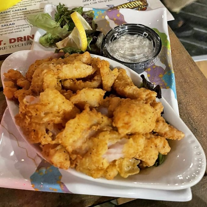 Tender morsels of grouper wearing a golden crust that shatters with each bite—the fish stick's sophisticated older sibling.