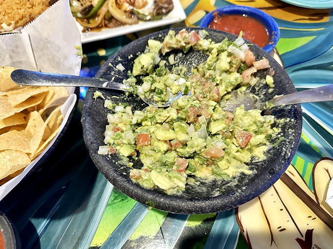 Guacamole that deserves its own stone pedestal. Chunky, fresh, and vibrant—this isn't some sad, mass-produced impostor.