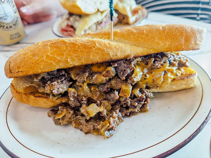 Half a Philly that delivers full-sized flavor – caramelized onions and tender beef creating a sandwich symphony that hits all the right notes.