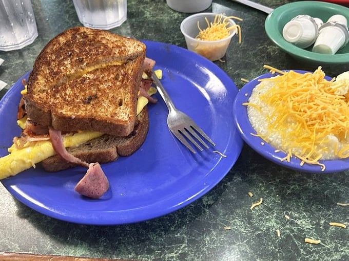 The perfect sandwich doesn't exi— Oh wait, here it is! Grilled to golden perfection with ham peeking out like it's playing hide and seek.