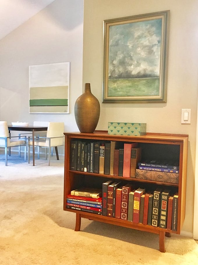 Not just a bookcase but a time capsule of literary treasures, standing ready to add intellectual gravitas to any room.
