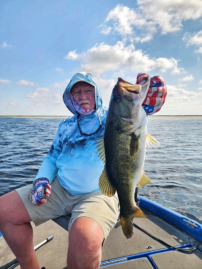 The smile says it all—Dunedin's waters deliver bass that would make even the most stoic angler break into a happy dance.