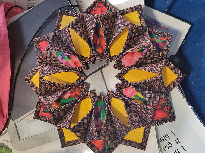 A handcrafted geometric design emerges from the chaos—proof that between the ordinary lies the occasional extraordinary find worth celebrating.