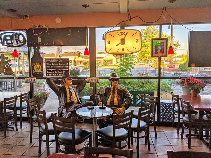The Blues Brothers statues keep watch over diners – silent guardians of good taste in both music and Cajun cuisine. 
