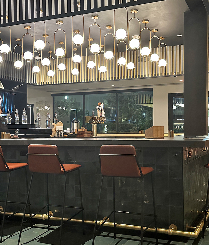Modern elegance meets traditional Mexican design in this stylish bar area. Those globe lights create an atmosphere that says, "Stay awhile and order another round."