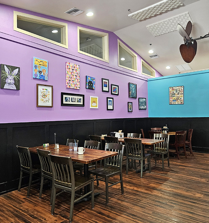 Wooden tables bathed in natural light create the perfect setting for both serious conversations and spontaneous laughter.