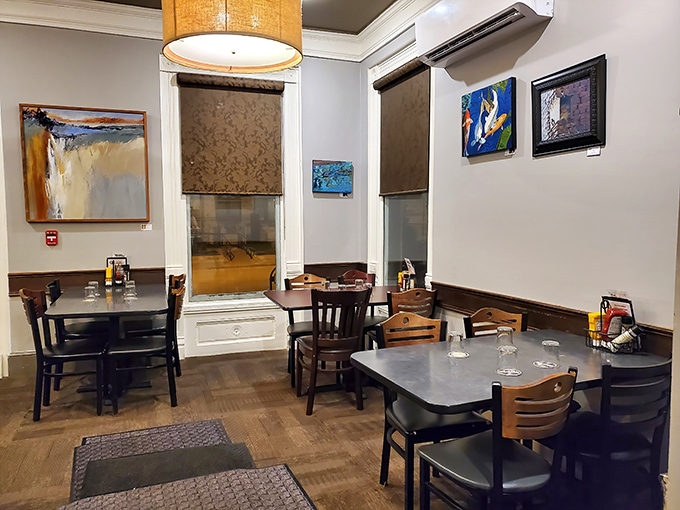 Art on the walls, art in the glass, art on your plate—this dining room understands that great food is a feast for all senses.