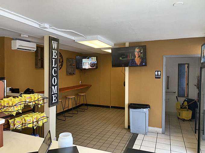 The "WELCOME" sign isn't just decoration—it's a promise kept with every sandwich served in this humble, functional space.