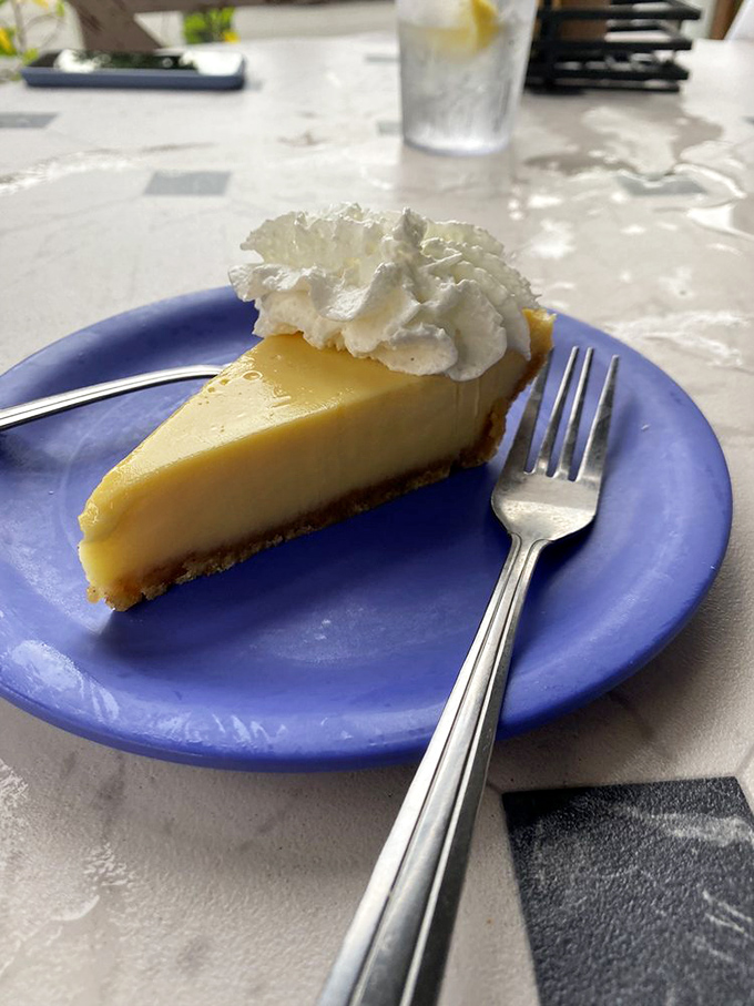 Key lime pie so authentic it should come with a tiny passport. The perfect balance of sweet and tart that makes your taste buds do the cha-cha.