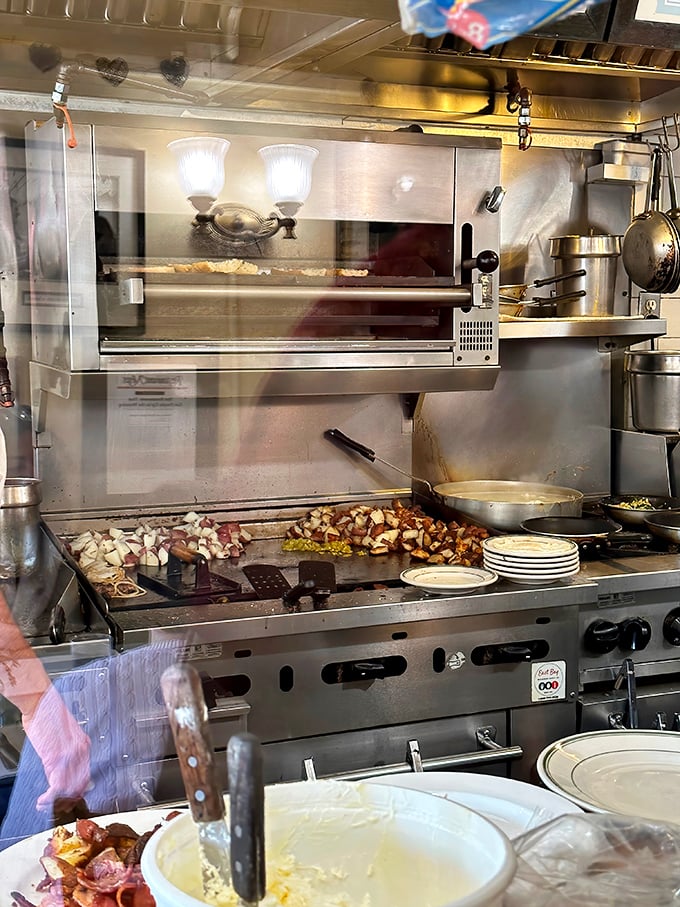 Where the magic happens. This bustling kitchen choreography transforms simple ingredients into the stuff of breakfast legend.