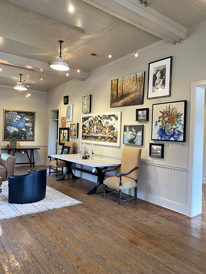 Art finds its natural home here, where gallery walls showcase local talent against the backdrop of original hardwood floors.