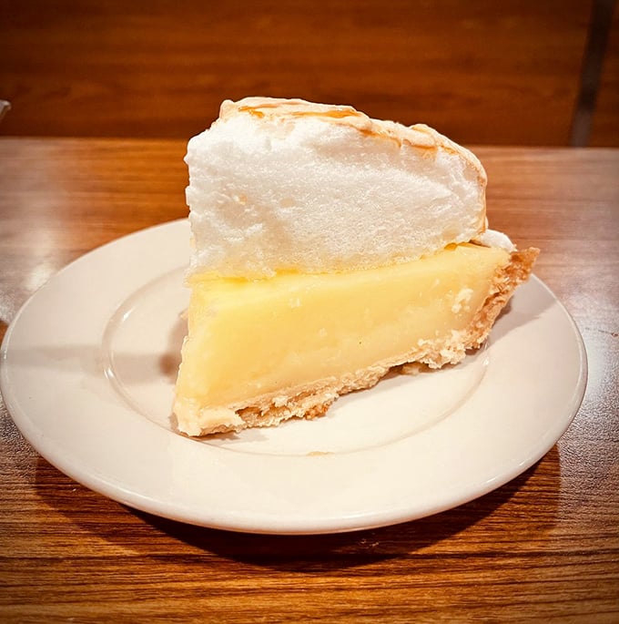 This lemon meringue pie doesn't need social media validation—it's been collecting real-life likes since before hashtags were invented.