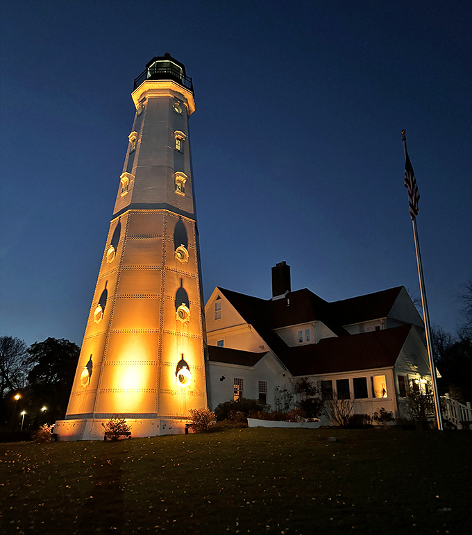 When darkness falls, this lighthouse transforms into a golden beacon that could make even city lights feel inadequate.