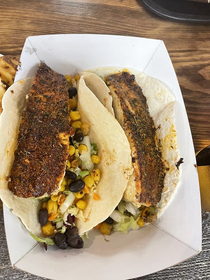 Blackened fish tacos where the spice-crusted mahi meets sweet corn and black beans—proof that Ohio understands good seafood.