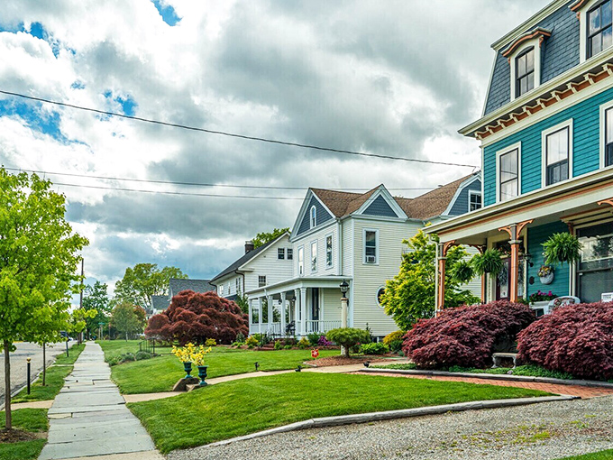 Victorian and Colonial homes line residential streets with manicured lawns and blooming gardens. These aren't just houses—they're time capsules with modern plumbing.