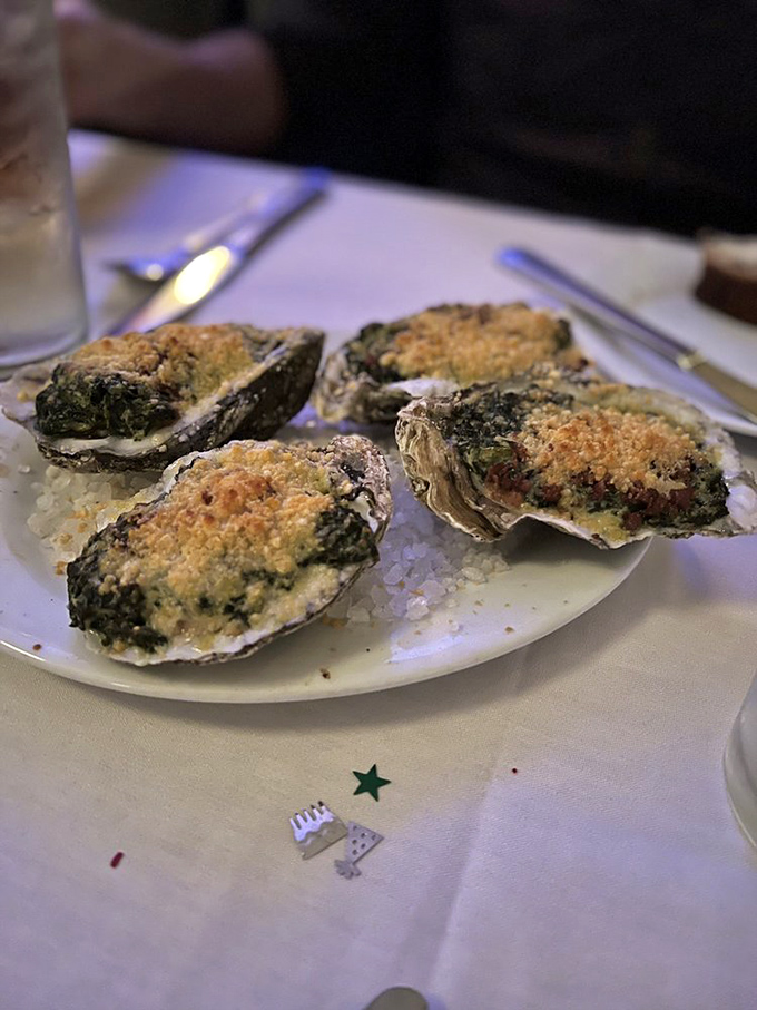 Oysters Rockefeller dressed for success—these bivalves have been upgraded from street clothes to formal wear with spinach, cheese, and breadcrumbs.
