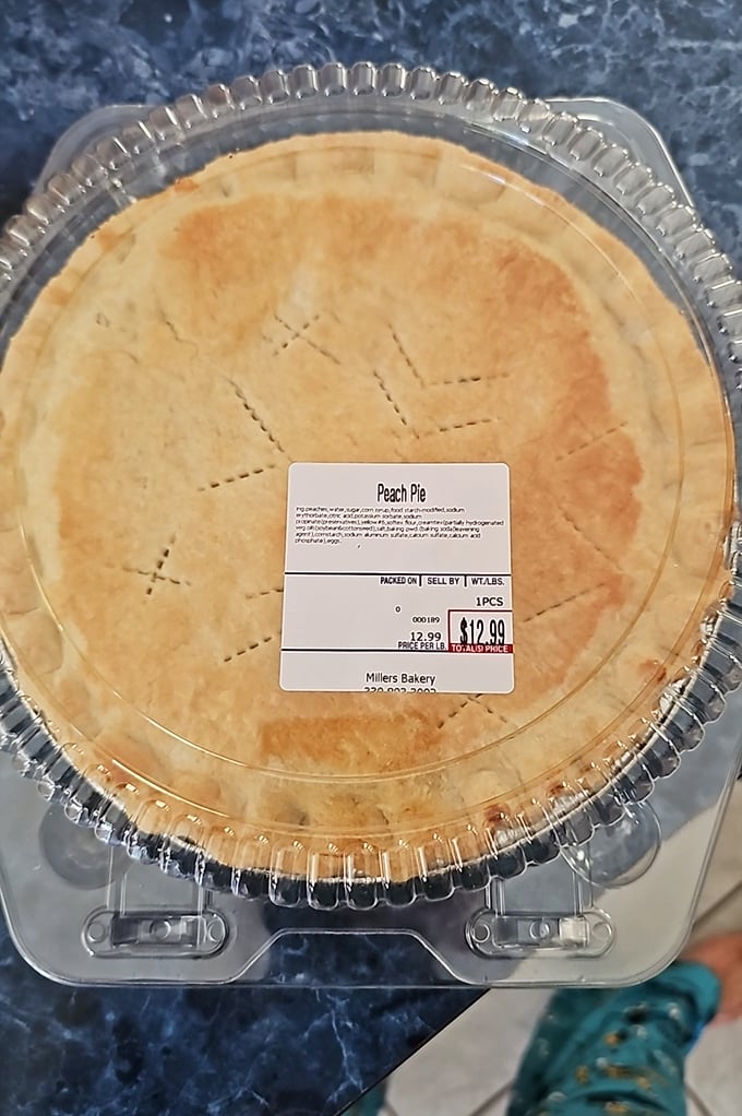 This peach pie isn't just dessert—it's summer sunshine captured in a perfect golden crust, ready to brighten even the cloudiest day.