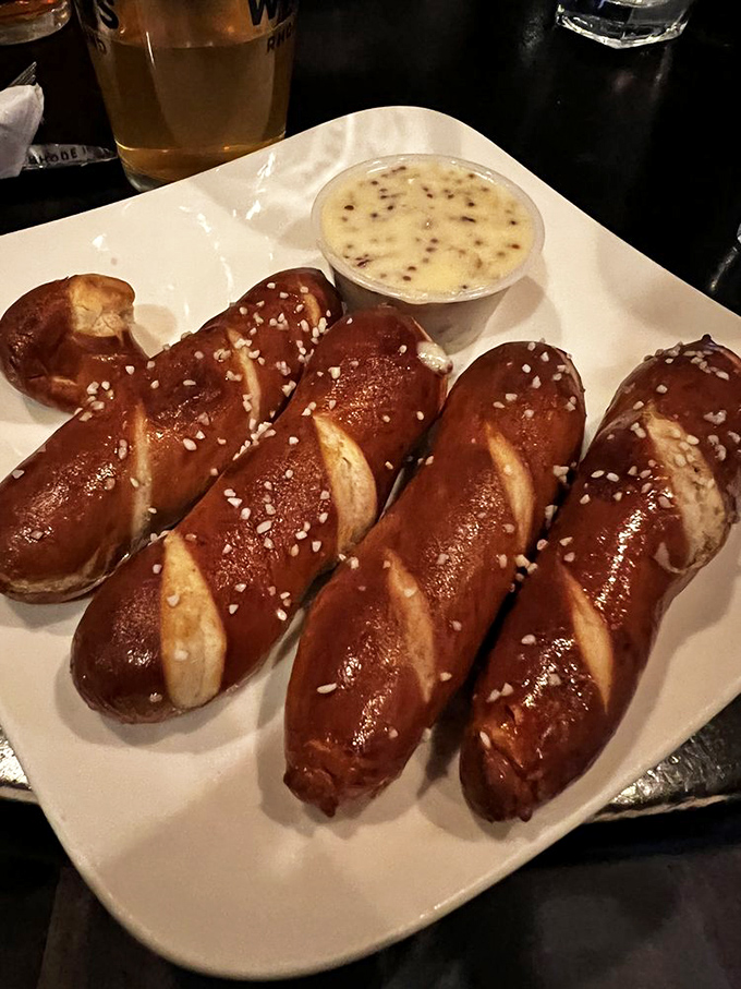 Bavarian pretzel sticks with beer cheese dip – carbs and dairy performing a duet so beautiful it deserves its own Broadway show.