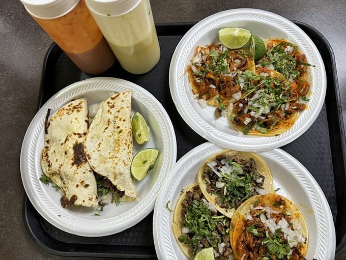 A feast fit for royalty served on humble paper plates. The contrast of colors isn't just Instagram-worthy – it's a preview of the flavor explosion to come.