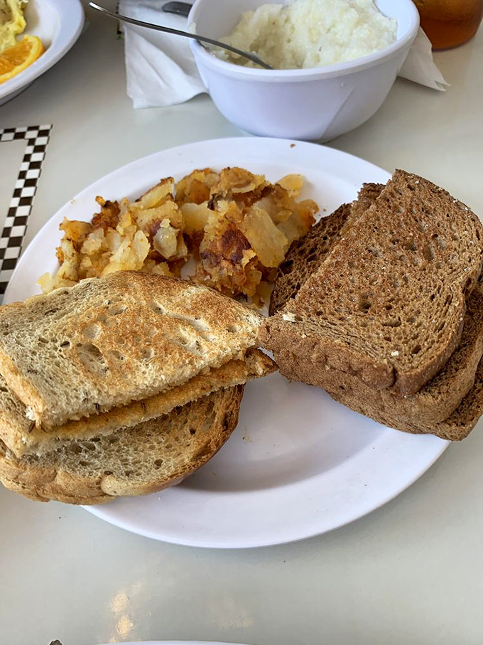 Toast—the unsung hero of breakfast, perfectly browned and ready to support whatever egg masterpiece you've ordered.