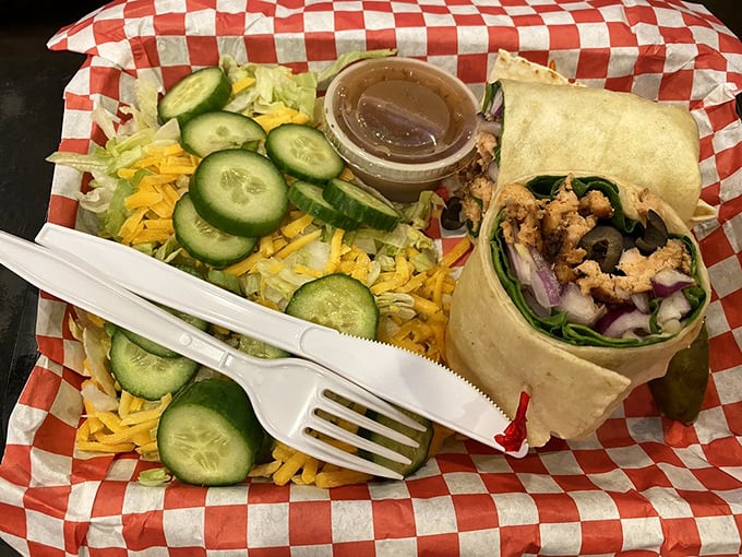 Even health-conscious diners find their happy place here. This wrap doesn't just contain salmon—it embraces it with fresh veggies and vibrant colors.