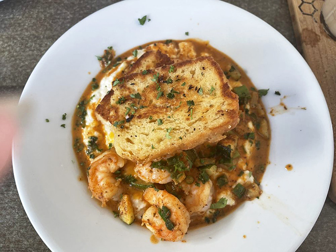 Shrimp and grits: the breakfast power couple that makes you wonder why anyone bothers with cereal. Southern tradition elevated to art form.