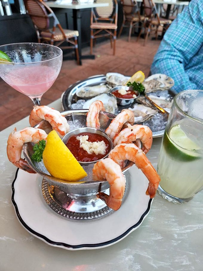 Shrimp cocktail that means business – plump crustaceans hanging off the edge of the glass like they're showing off at the pool.