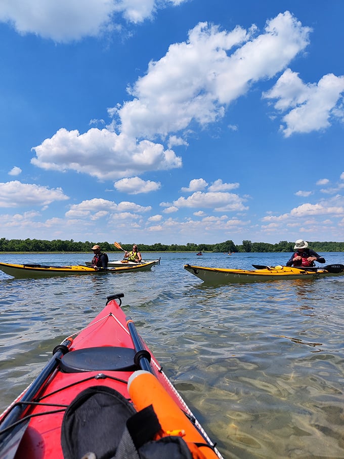 Summit Lake State Park proves you don't need ocean views for water recreation – these kayakers are enjoying serenity without coastal price tags.