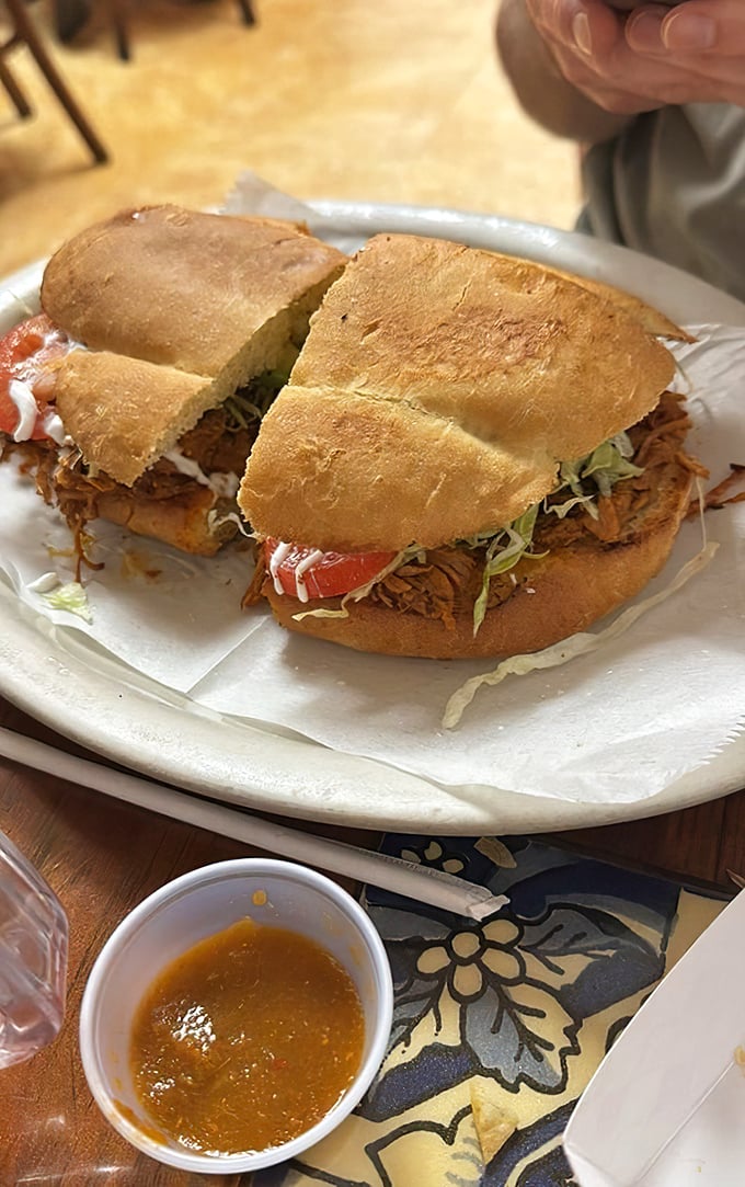 This torta isn't just a sandwich—it's architecture, engineering, and art all wrapped in bread that's both sturdy and yielding.