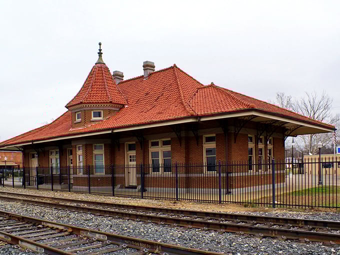 This isn't just a train station—it's a time machine. The historic depot's terracotta roof and brick details showcase craftsmanship from a bygone era.