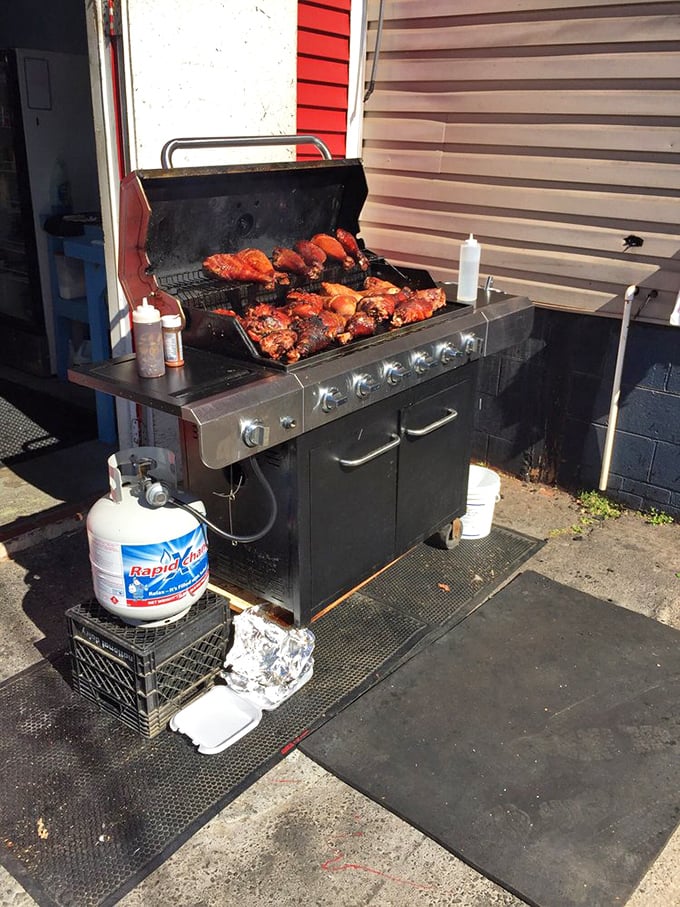 BBQ perfection in progress! These slow-cooking meats aren't just food—they're aromatic ambassadors converting passing shoppers into hungry customers with each waft of smoky goodness.