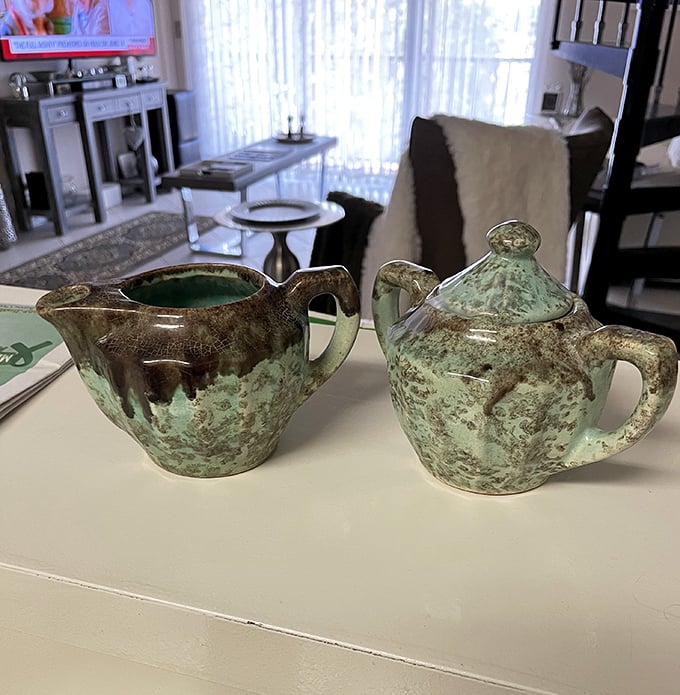 These mottled green vintage pottery pieces aren't just kitchenware—they're functional art that survived decades of Sunday dinners and holiday gatherings.