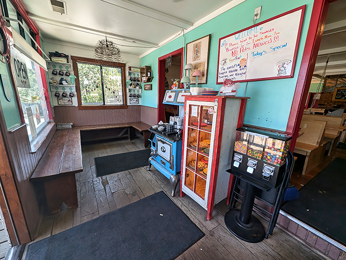 The waiting area—where anticipation builds and the vintage stove reminds you this place earned its name honestly.