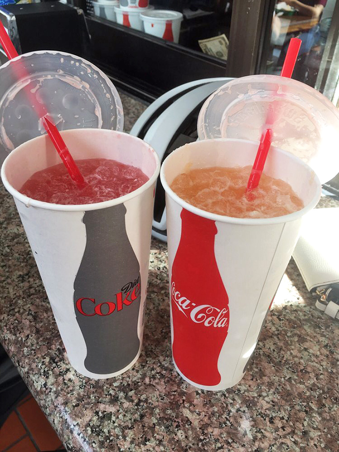 Aguas frescas in their natural habitat. These vibrant fruit waters aren't just beverages—they're the perfect palate cleansers between bites of savory perfection.
