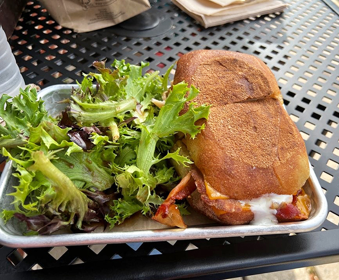 This isn't just a sandwich—it's architecture, where every layer of turkey and bacon has been precisely engineered for structural integrity.