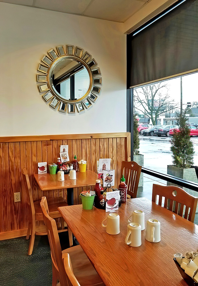 Window seats at Grand Day Cafe—where you can watch the world go by while contemplating the deeper meaning of perfectly buttered toast.
